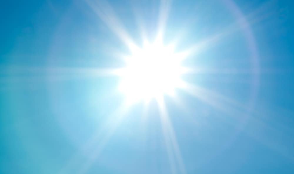 How Hot Does It Have To Be To Tan? (Everything To Know)