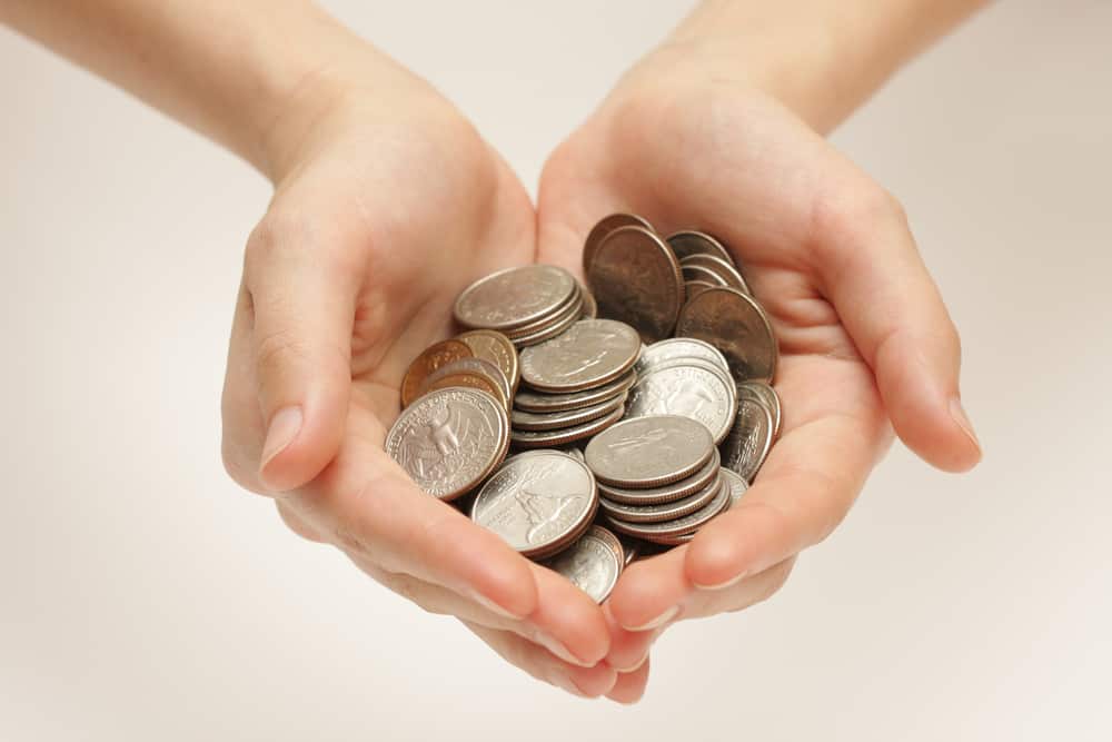 How Much Does A Roll Of Quarters Weigh? (Explained)